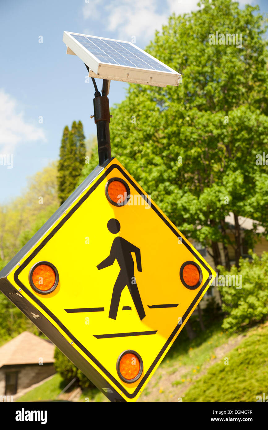 Solar powered crosswalk sign on a sunny day Stock Photo - Alamy