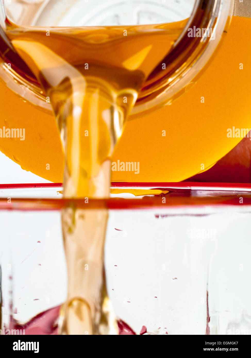 Pouring Colorful Energy or Fruit Drink Stock Photo - Alamy