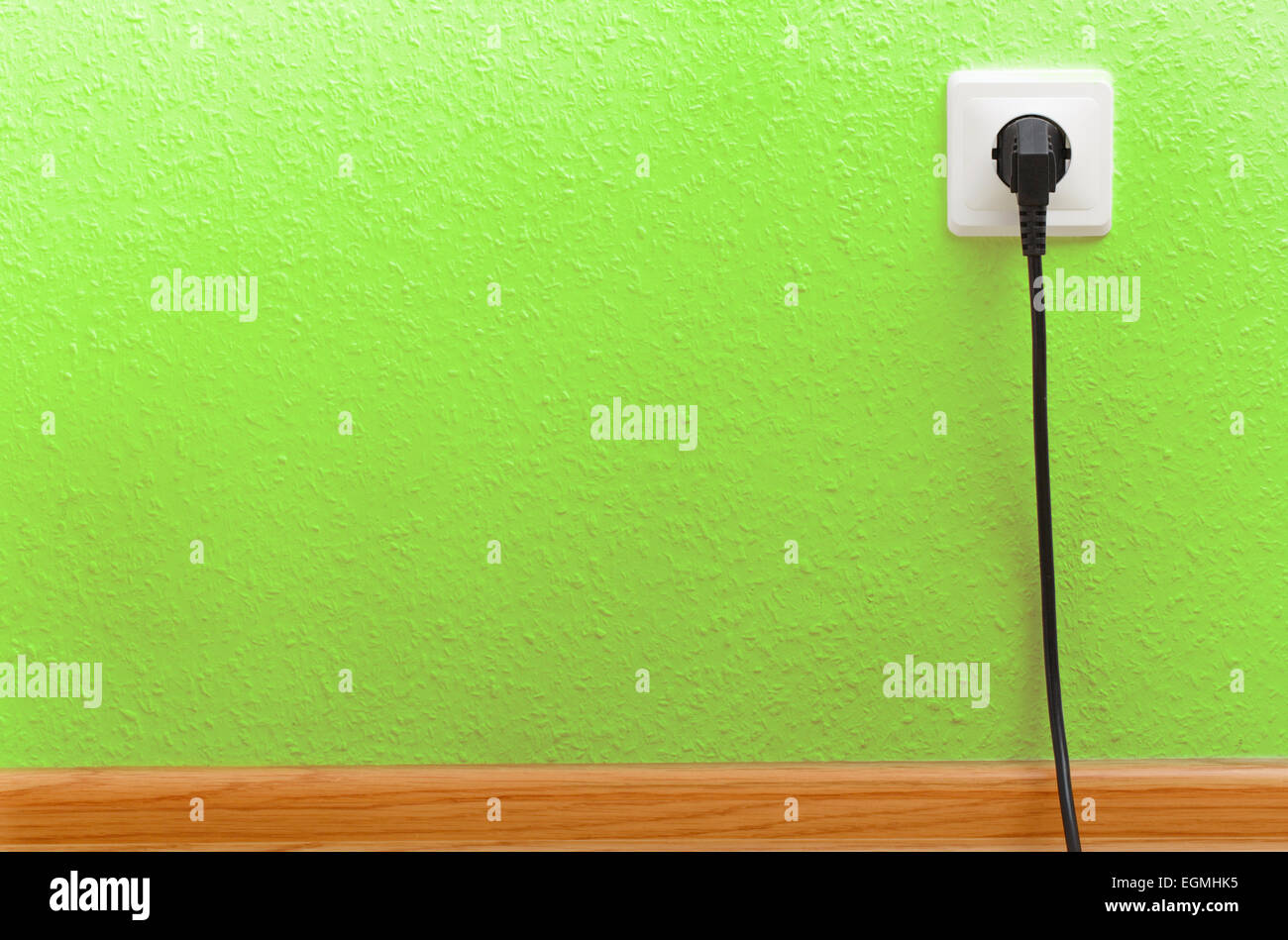 Single electric socket with plug on wall Stock Photo - Alamy
