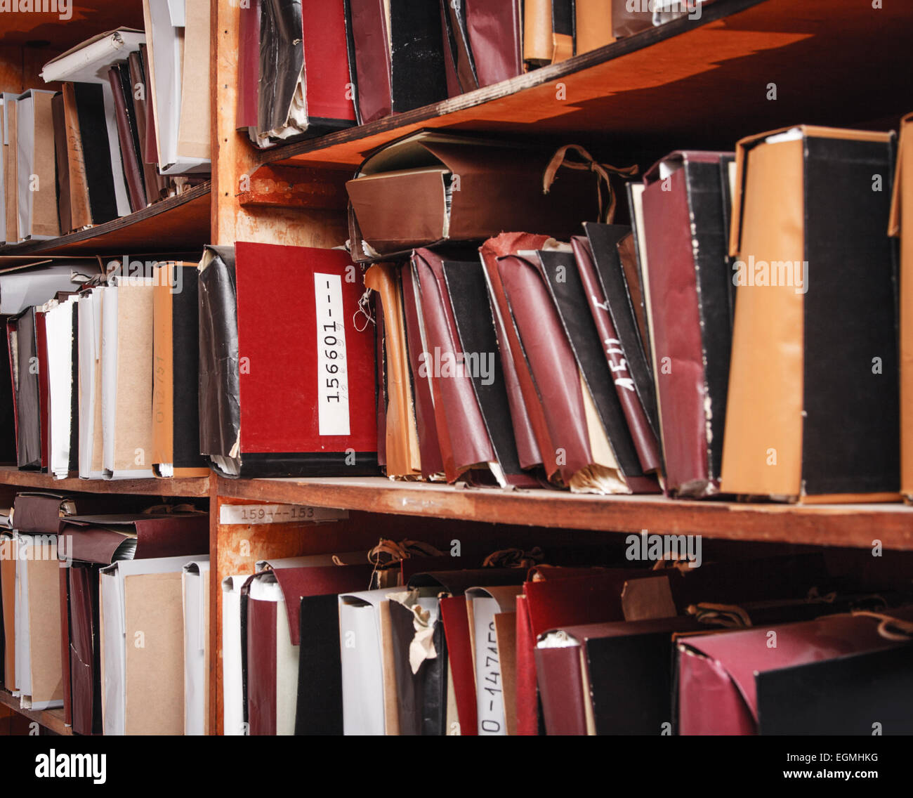Paper documents stacked in archive on shelf Stock Photo - Alamy