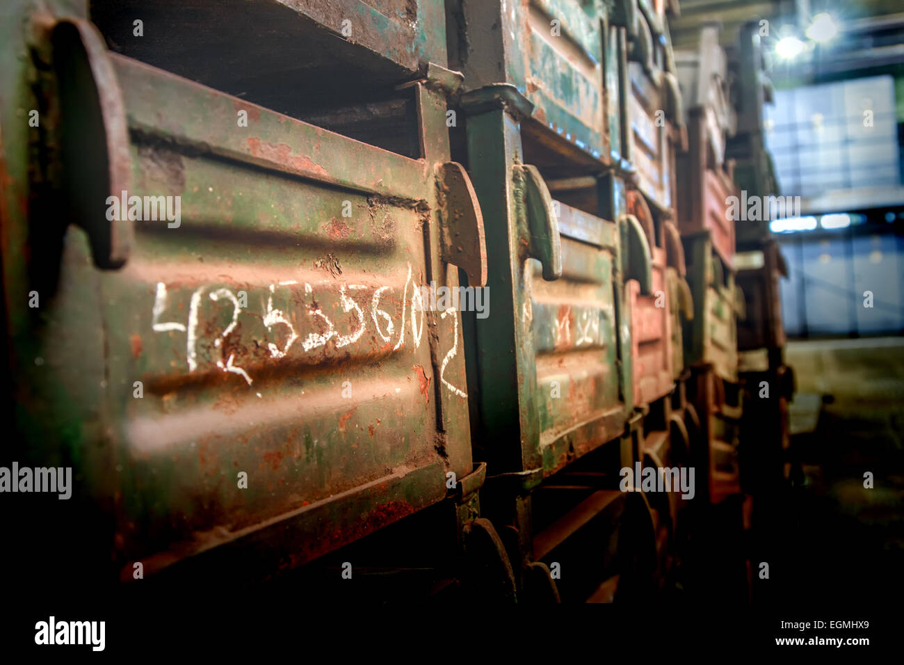 Old metal boxes stacked in storehouse of factory Stock Photo - Alamy