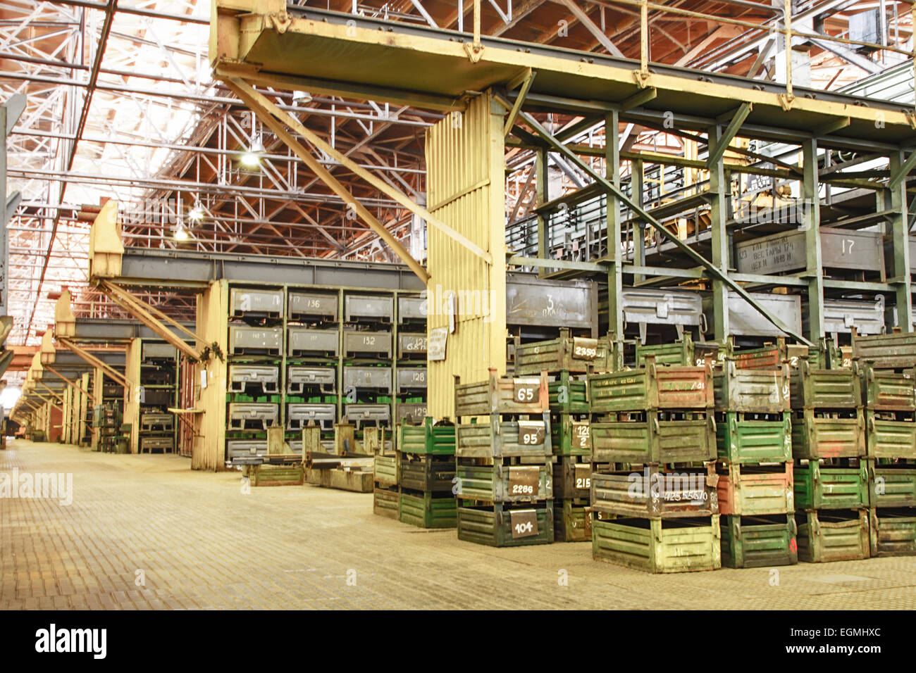 Big storage room with metal boxes in factory Stock Photo - Alamy