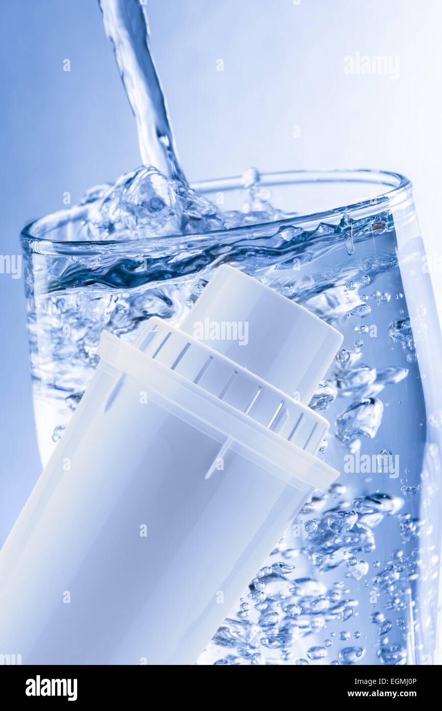 New water filter tube with glass on white background Stock Photo - Alamy