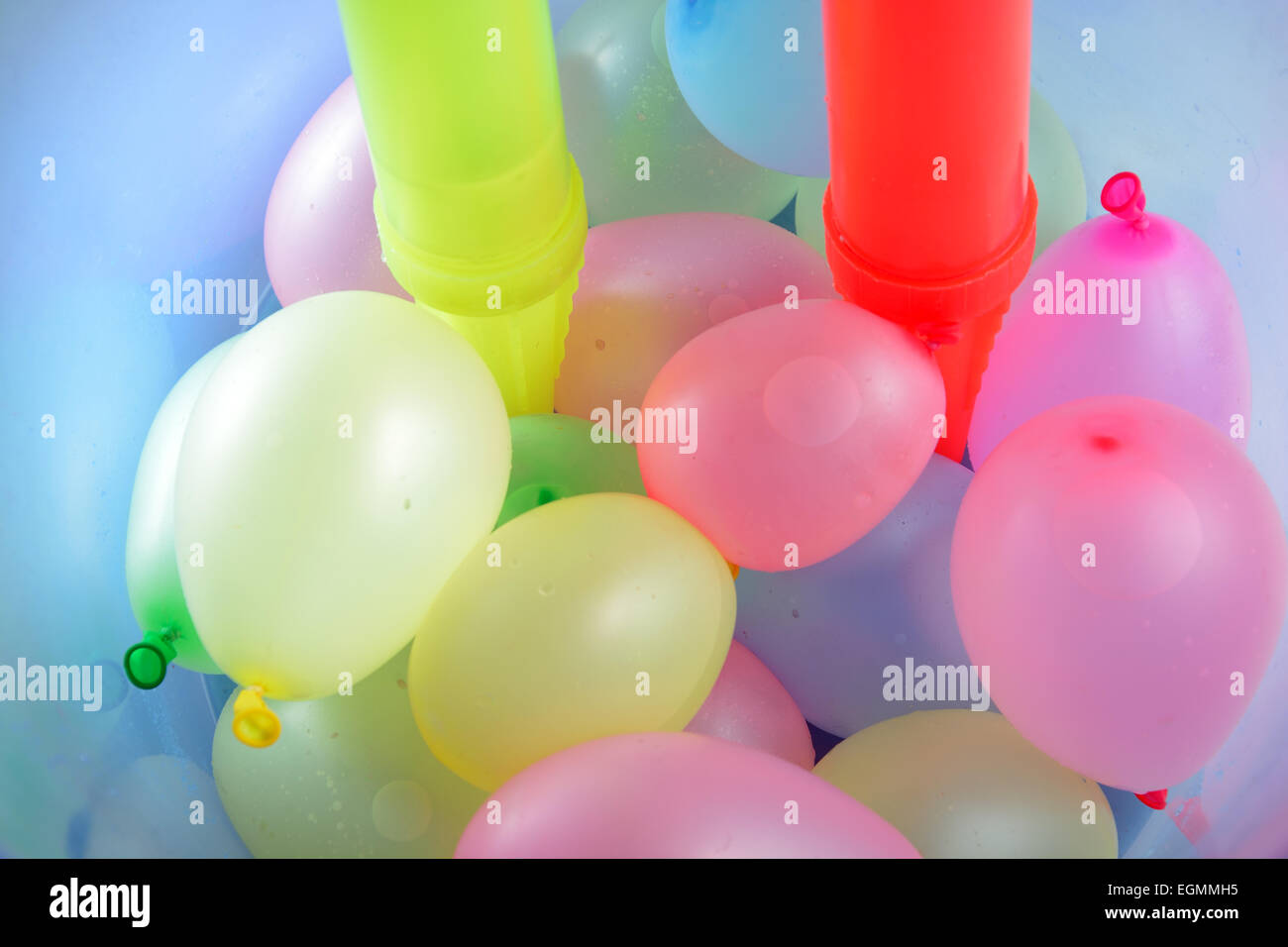 Colorful balloons & Water guns Stock Photo - Alamy