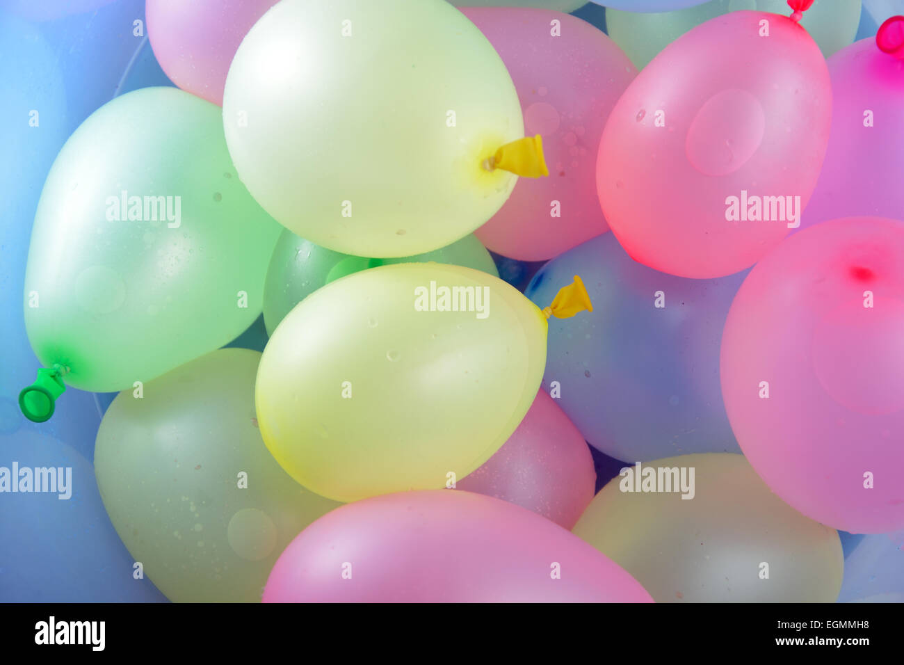 Colorful balloons & Water guns Stock Photo - Alamy