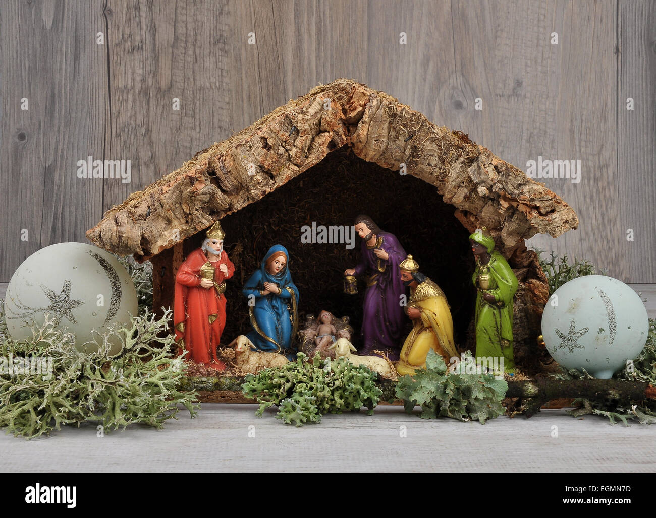 Family with christmas crib and tree hi-res stock photography and images ...