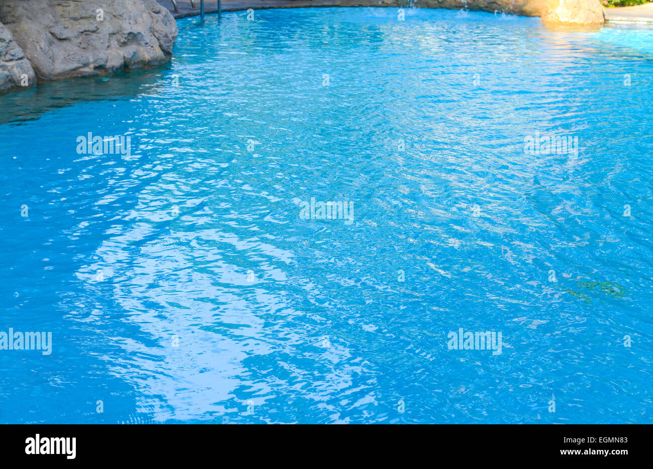 Blue water in the swimming pool with a wave Stock Photo - Alamy