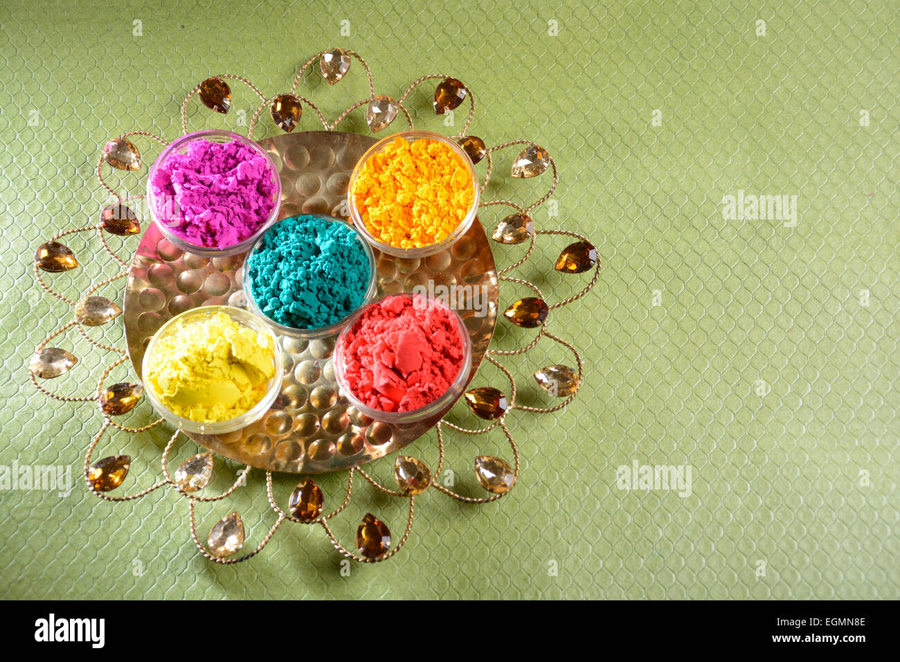 Colorful gulaal in the bowl Stock Photo - Alamy