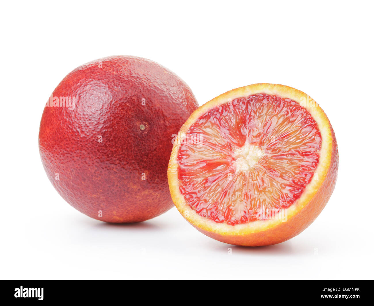ripe blood red oranges with half isolated on white Stock Photo - Alamy