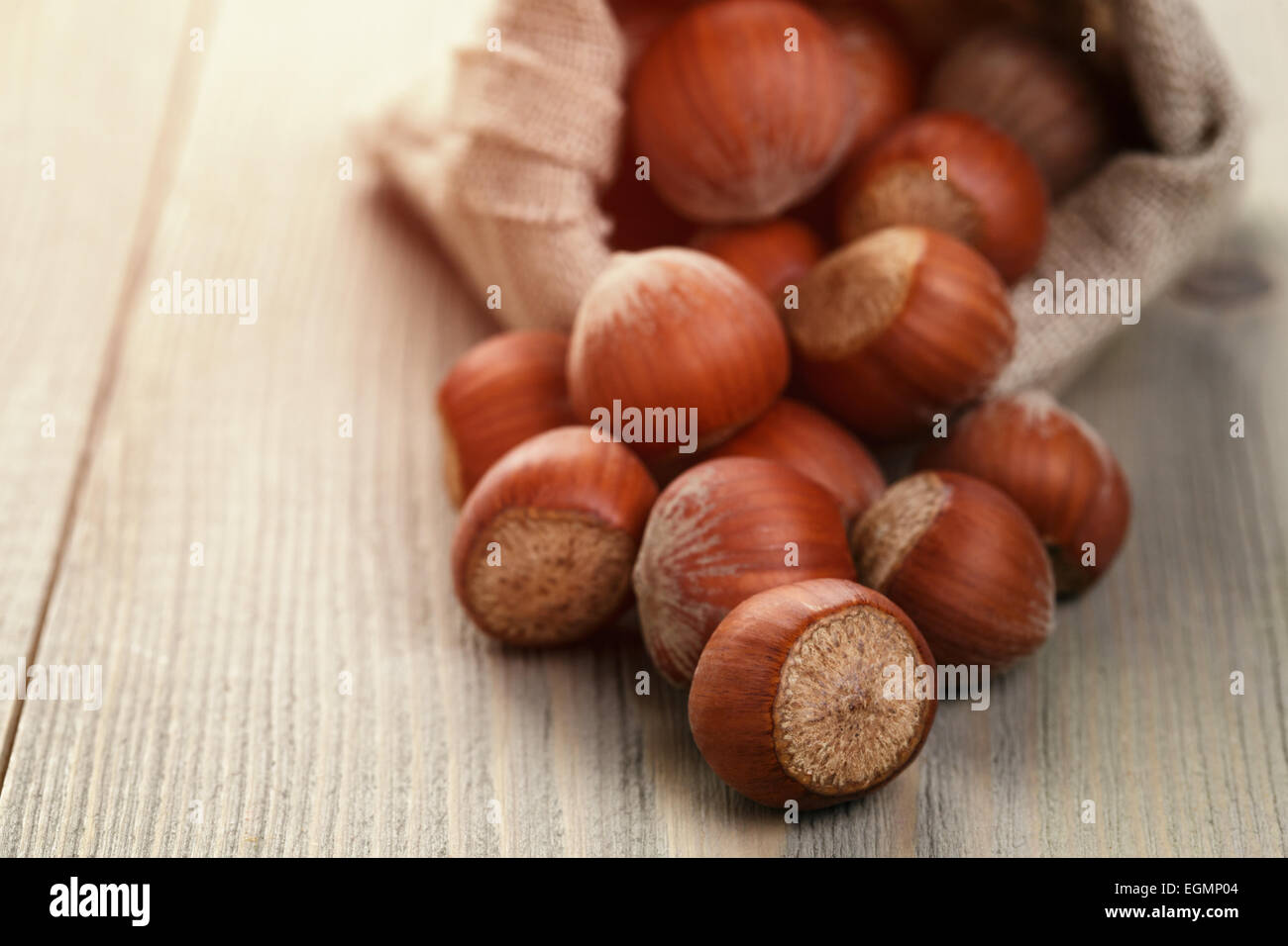 sack bag full of hazelnuts, rustic style photo Stock Photo - Alamy