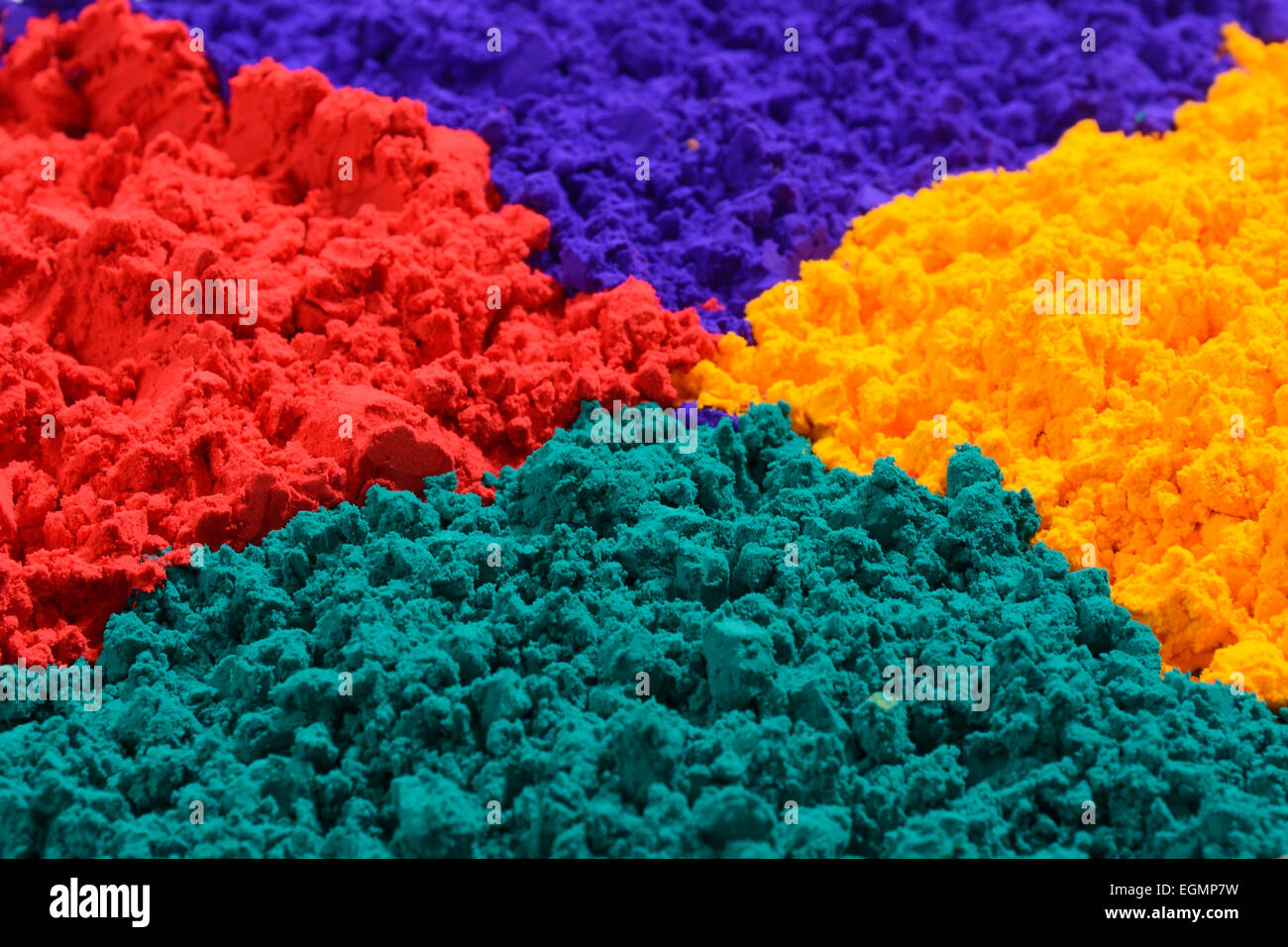 Colorful gulaal in the bowl Stock Photo - Alamy