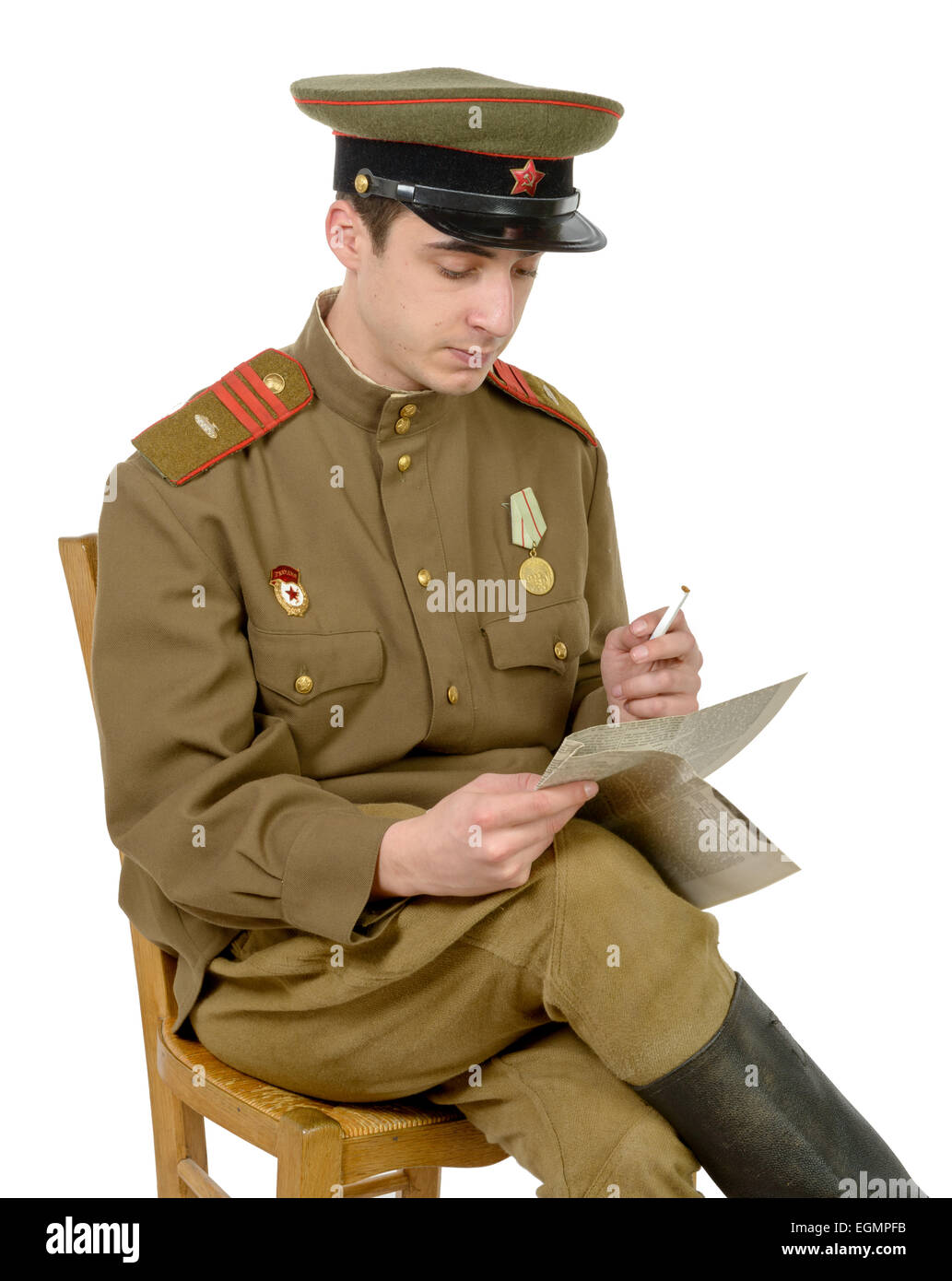 Male soldier sitting in chair hi-res stock photography and images - Alamy