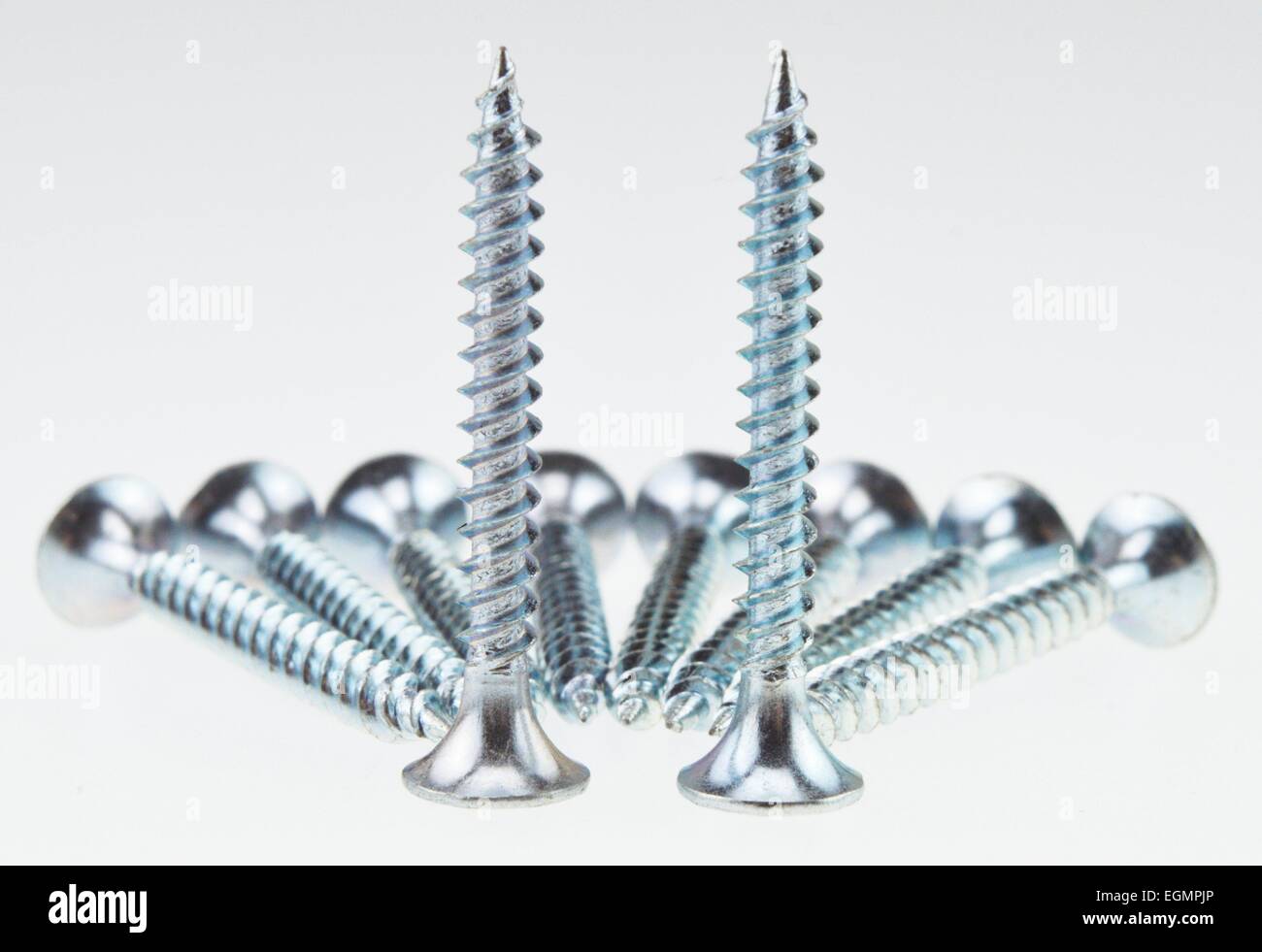 Silver wood screws Stock Photo - Alamy