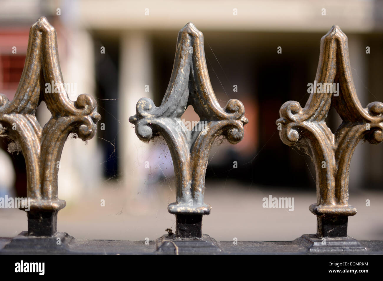 Metal railing detail - elaborate design painted gold and black Stock ...