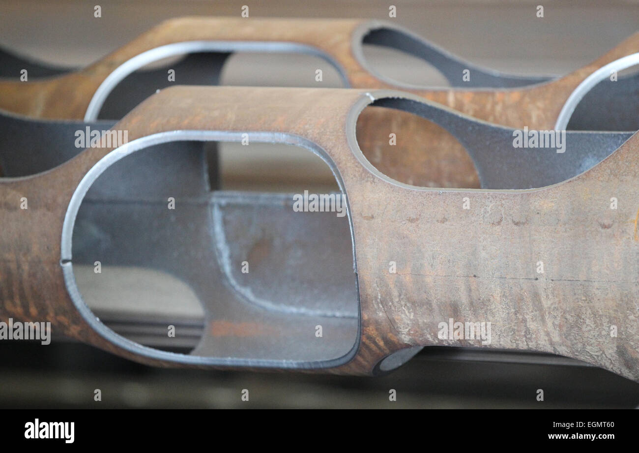 pipe with oval holes as part of metal structures Stock Photo - Alamy