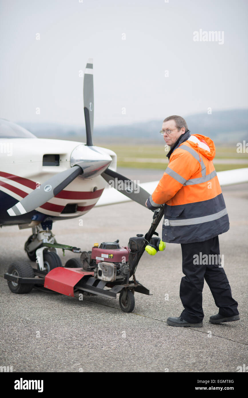 airport worker behind the scenes at Shoreham (Brighton City) Airport ...