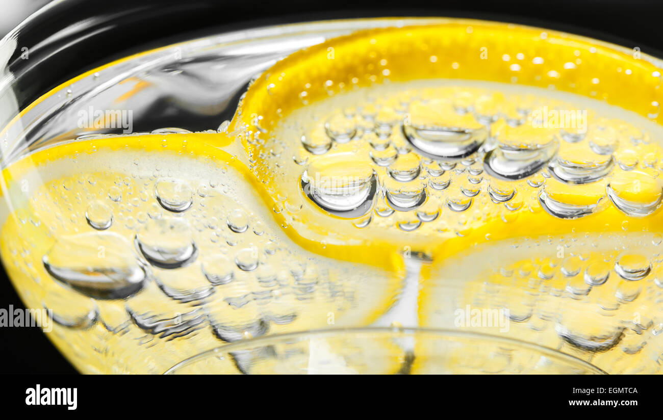 lemon in glass Stock Photo - Alamy