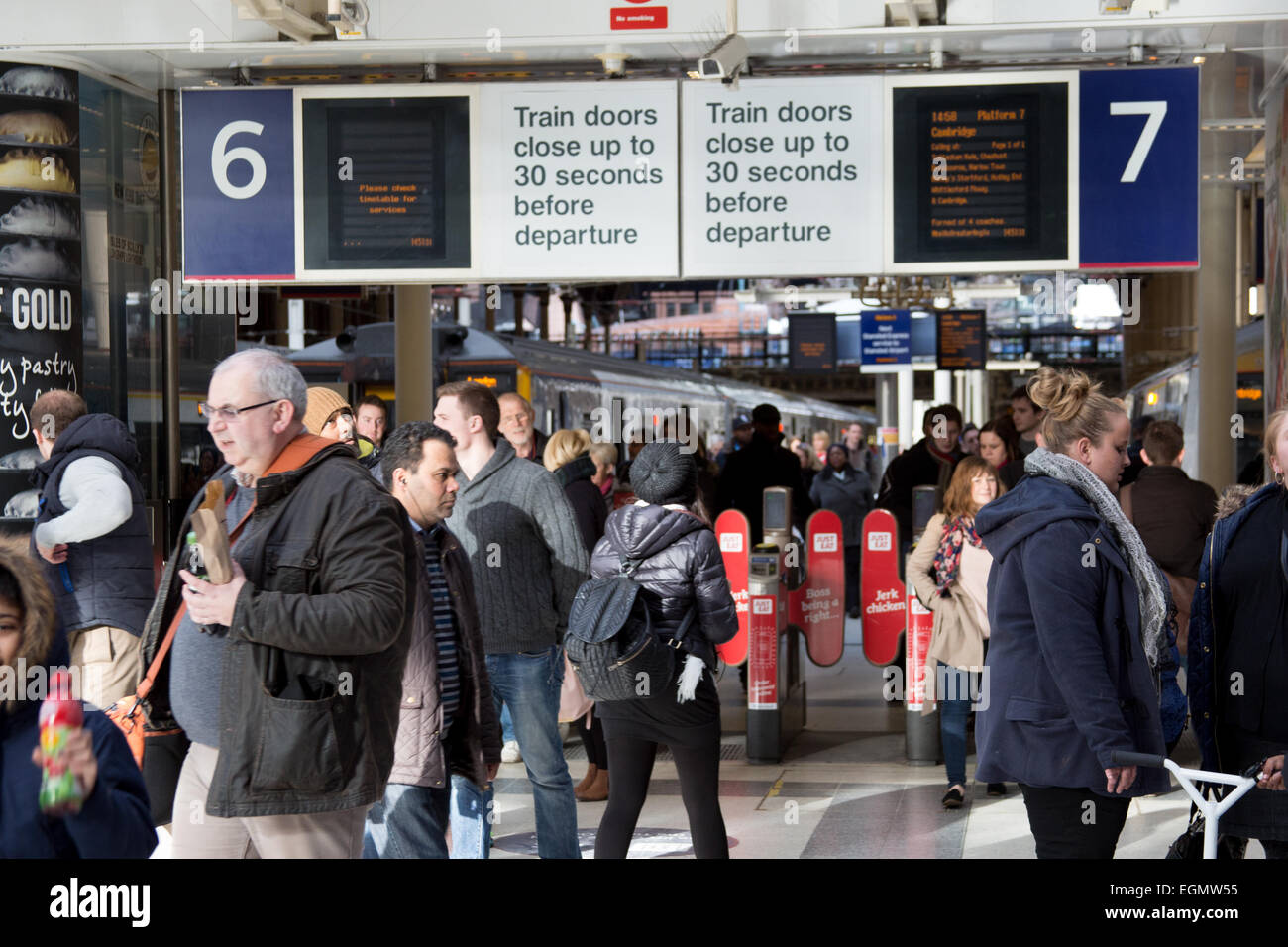 Passengers at Platforms 6 and 7 at London Liverpool Street Railway ...