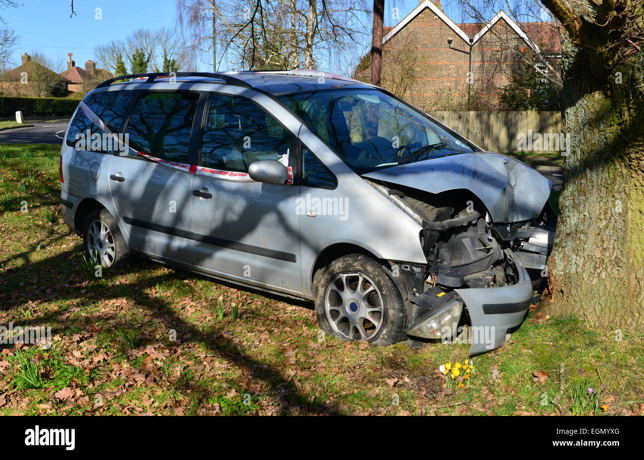 A crashed Ford Galaxy on a roundabout in Horley Stock Photo - Alamy