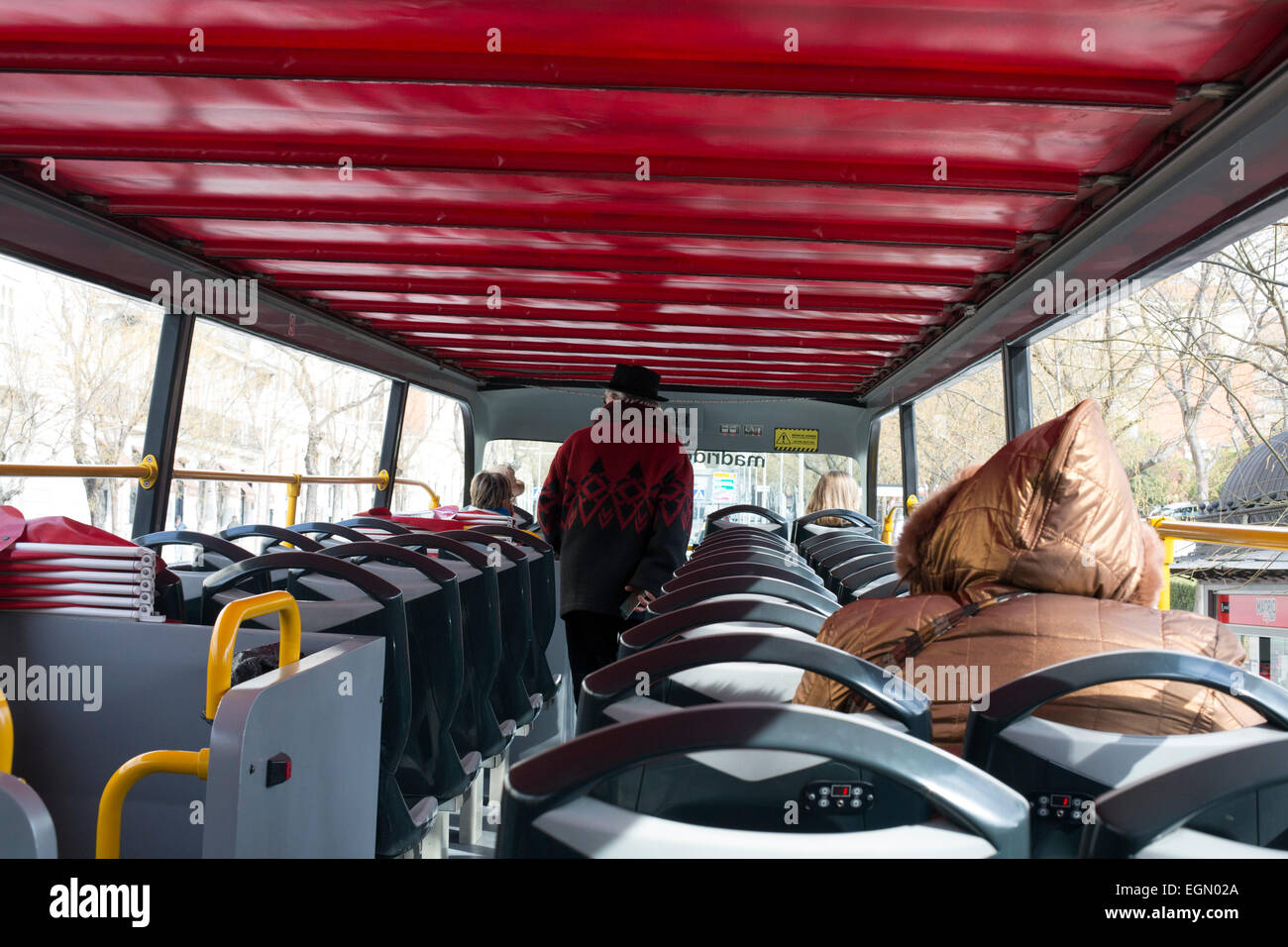 Convertible tourist bus with retractable roof open Stock Photo - Alamy