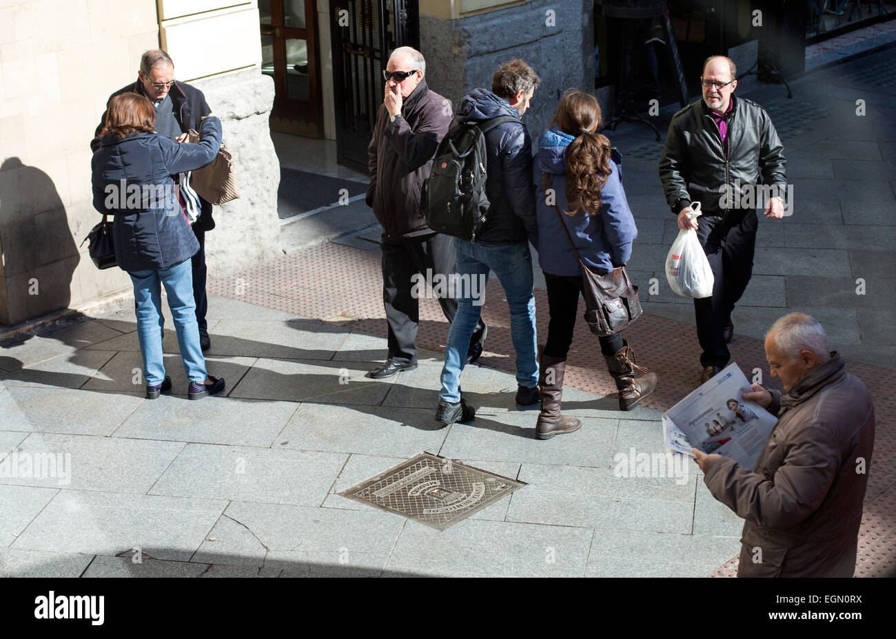Street scene pedestrians pavement walk chat shop Stock Photo - Alamy