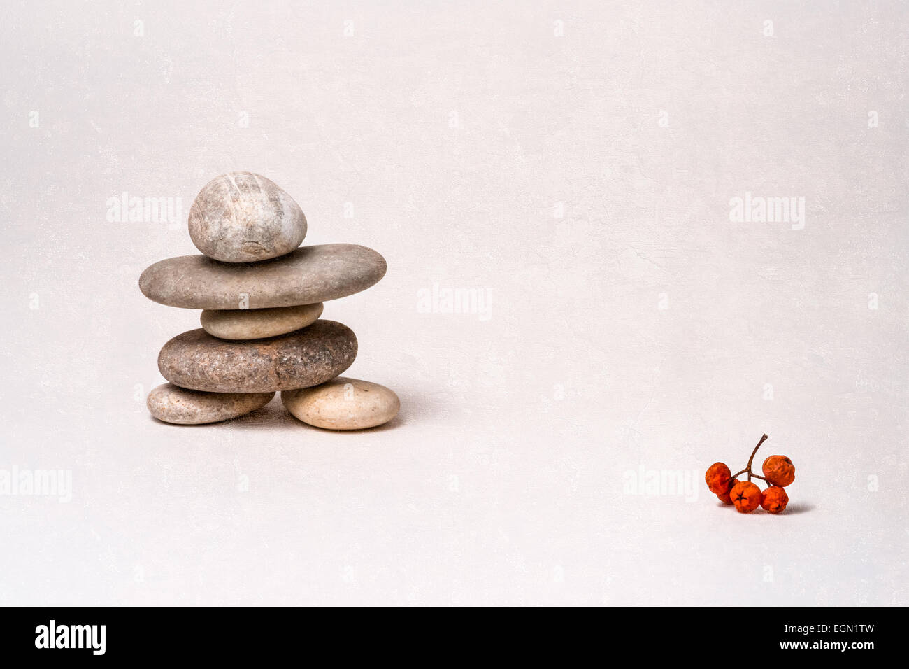 Pile of pebbles, stones of gray color in the form of a human body and a ...