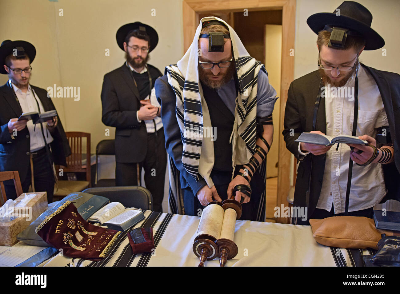 Orthodox Jewish prayer services in the basement of a mourners home in ...