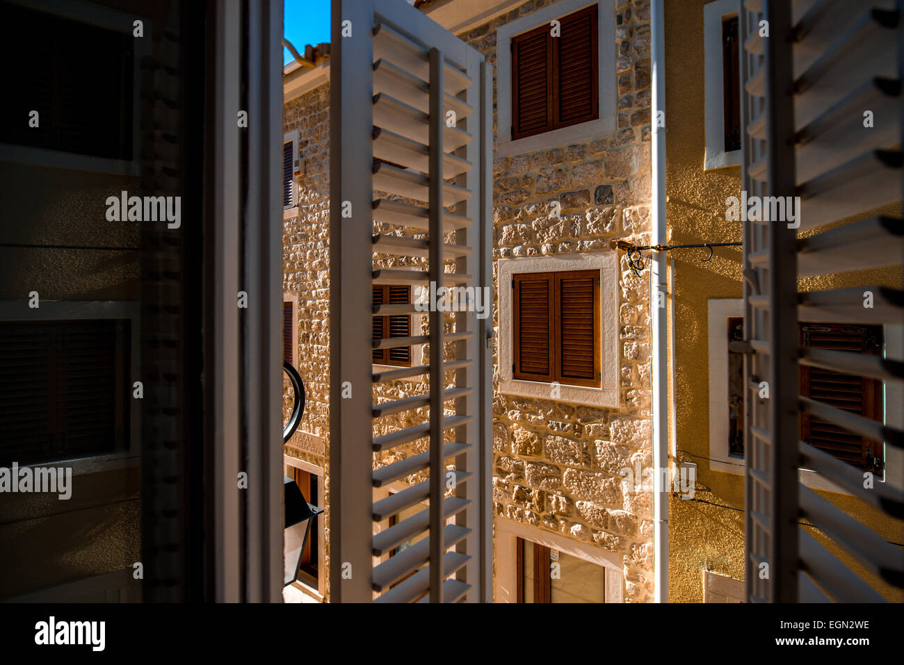 Old city windows in the city hi-res stock photography and images - Alamy