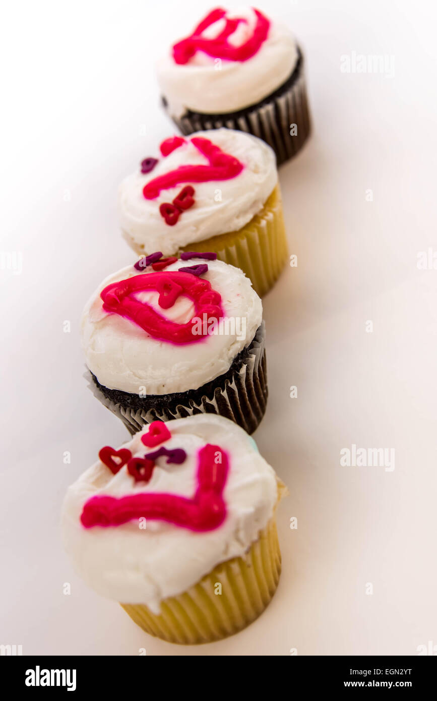 Valentines Day cupcakes with frosting letters spelling LOVE Stock Photo ...