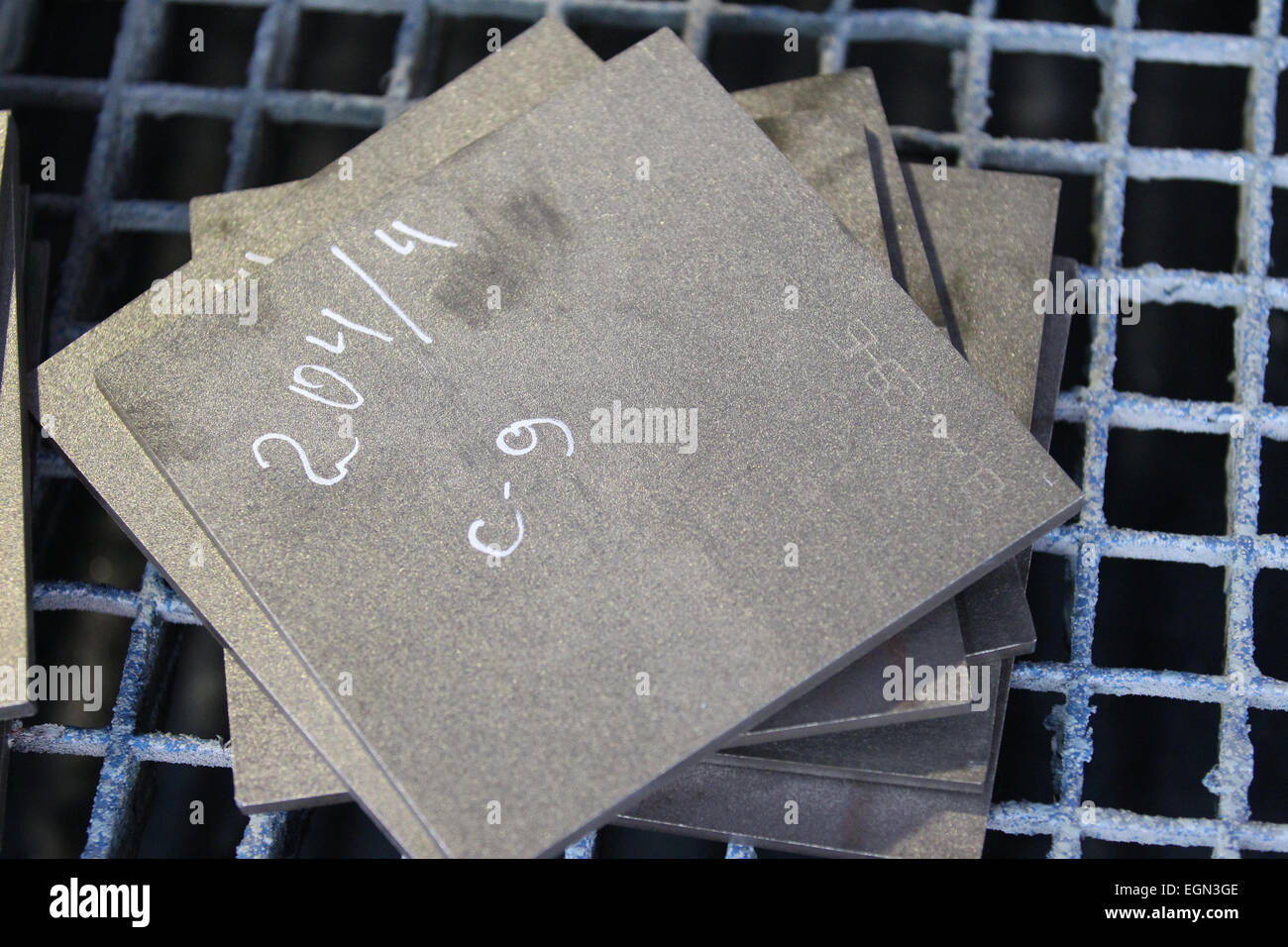 square polished metal plate segments for further processing Stock Photo ...