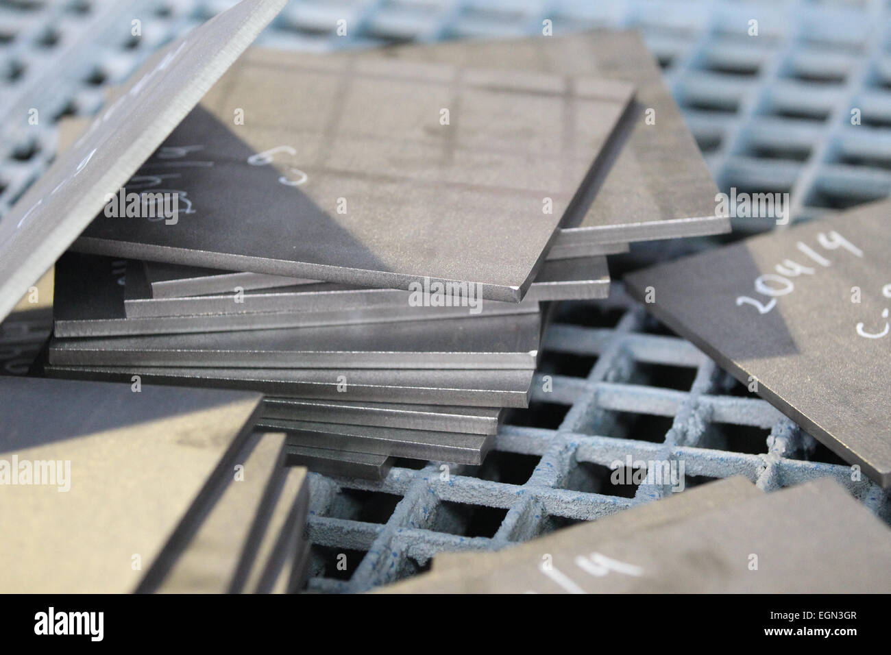 square polished metal plate segments for further processing Stock Photo ...