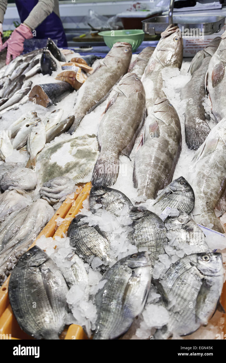 Fresh fish in a market, detail of an old fishmonger, healthy food, sea ...