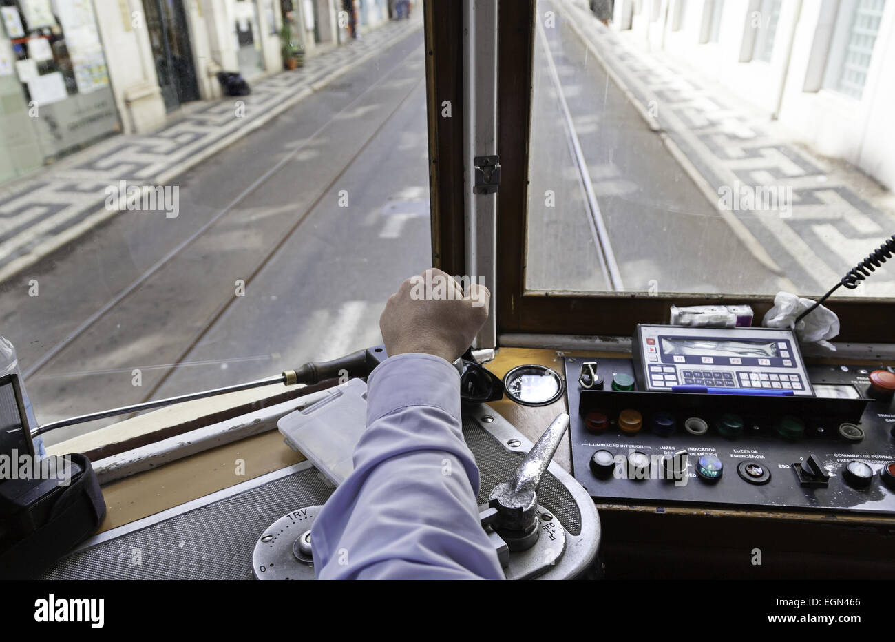 Driver tram in Lisbon, detail of a person wearing an old tram travelers ...
