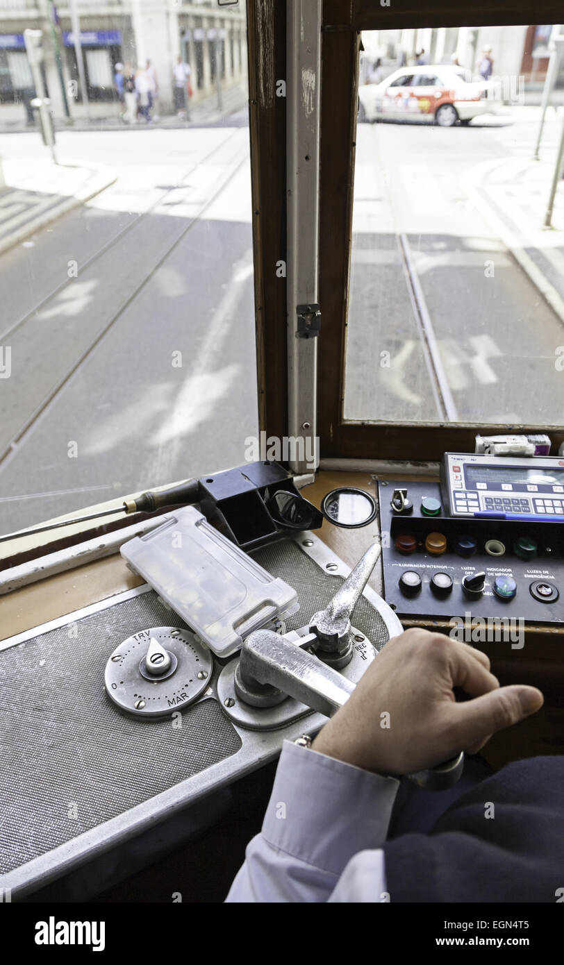 Driver tram in Lisbon, detail of a person wearing an old tram travelers ...