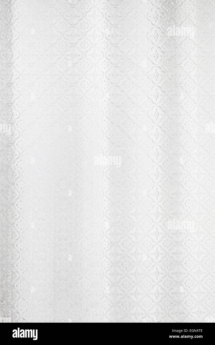 White glass window detail of a decorated white crital, safety and ...