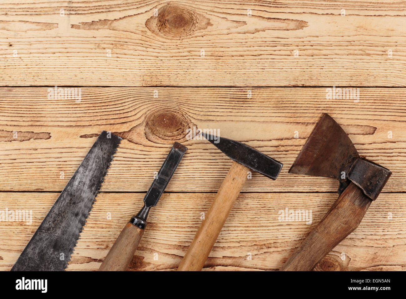 Old carpentry tools on a wooden background Stock Photo - Alamy