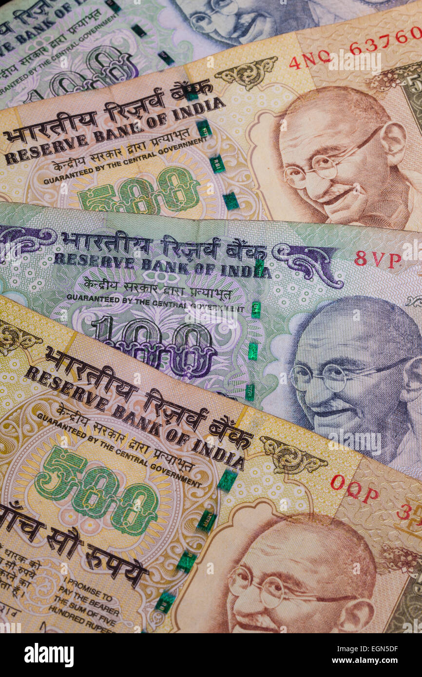Different banknotes from India on the desk Stock Photo - Alamy