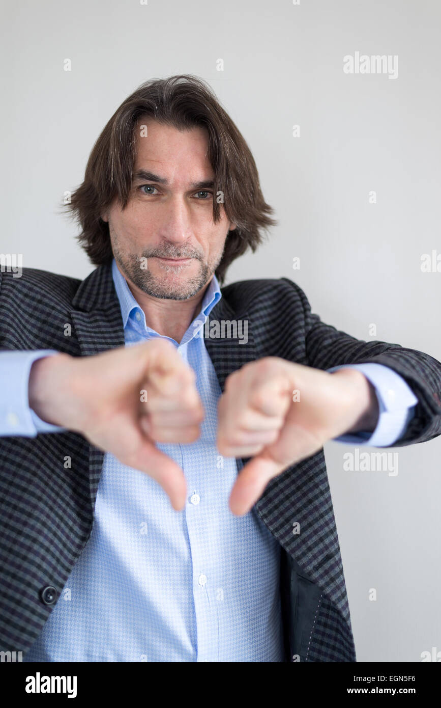 The man gestured shows that everything is bad Stock Photo - Alamy