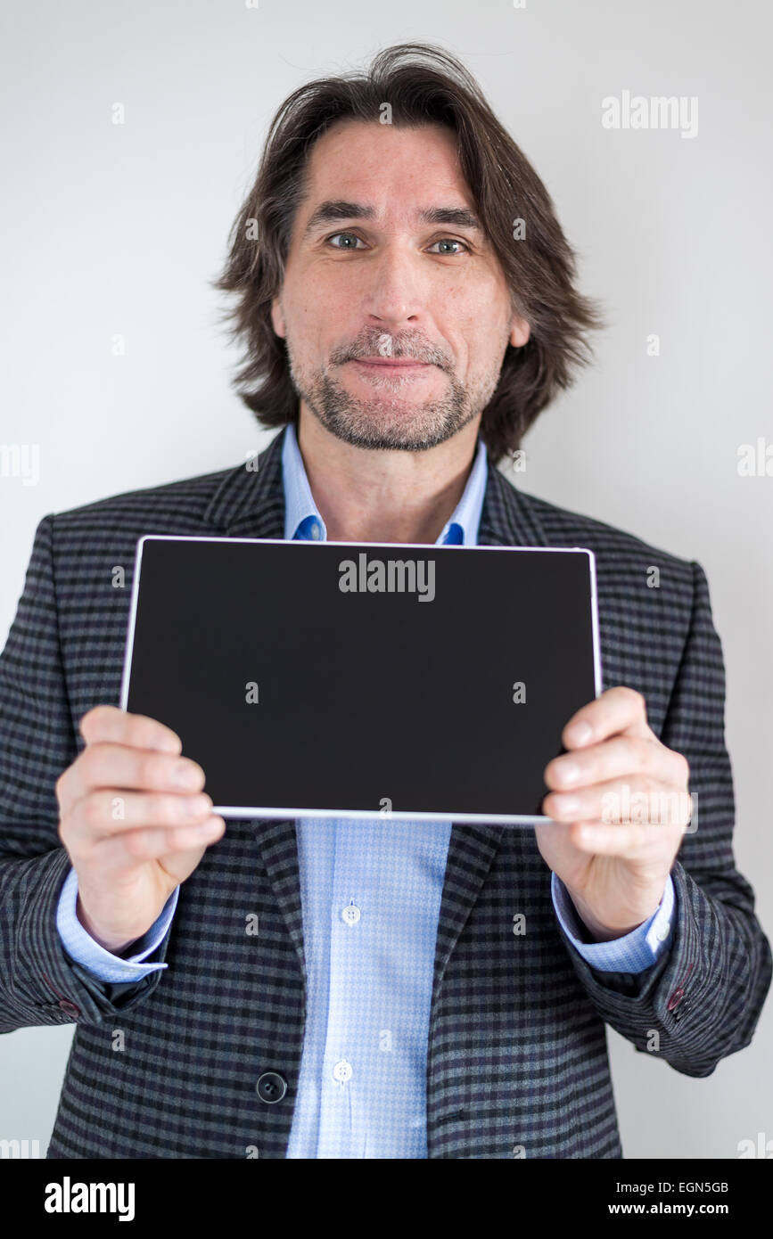 man with the tablet in his hands Stock Photo - Alamy