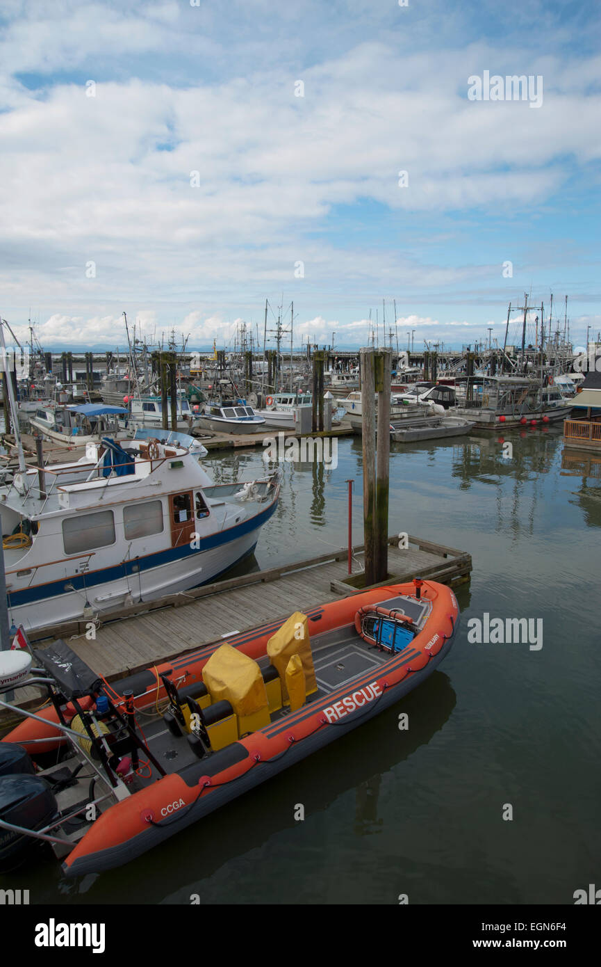 Rescue boat docked in marina Stock Photo - Alamy