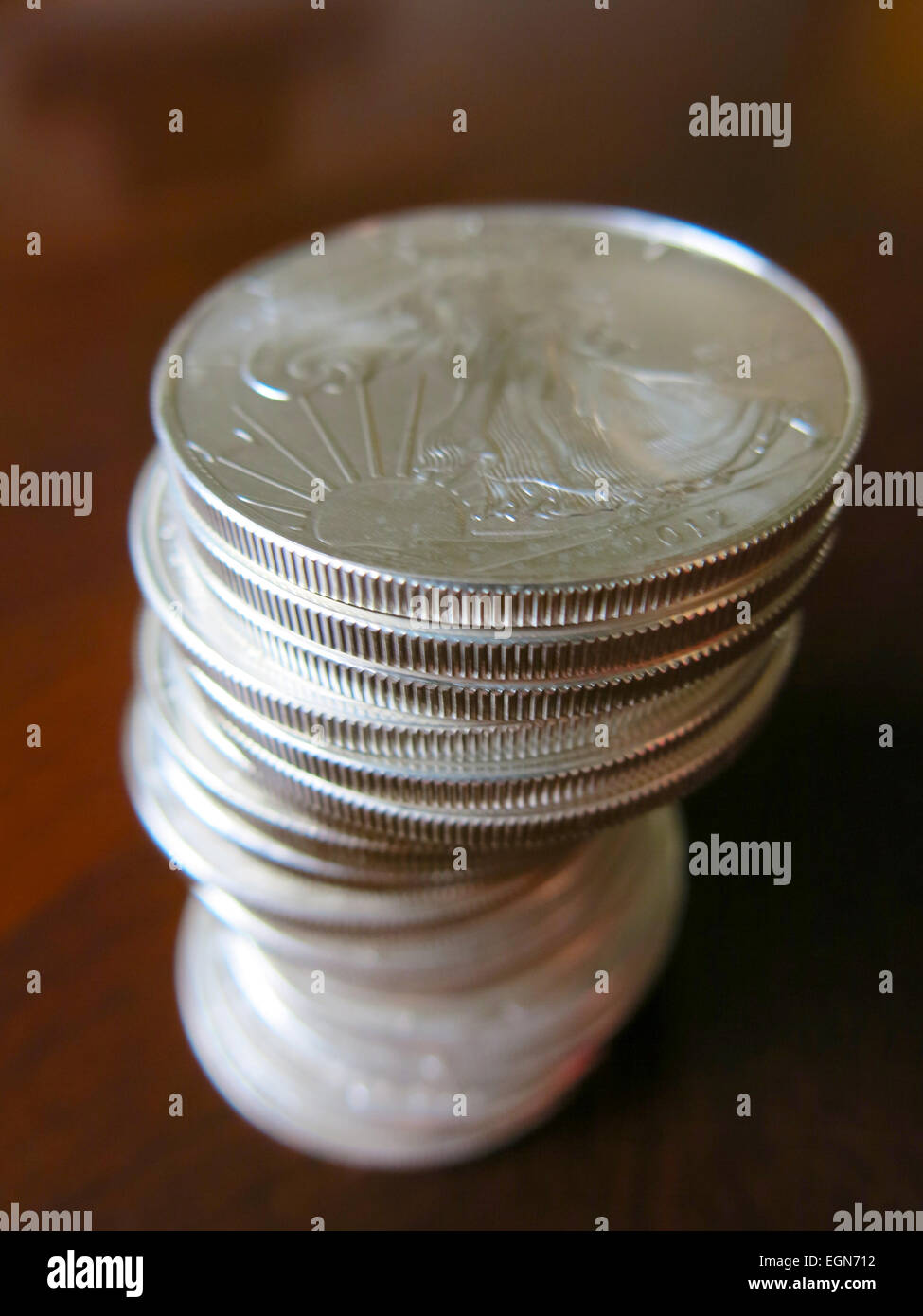 Stack of silver coins Stock Photo - Alamy