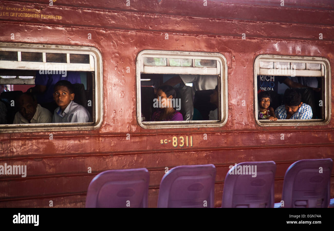 Local commuters in old train Stock Photo - Alamy
