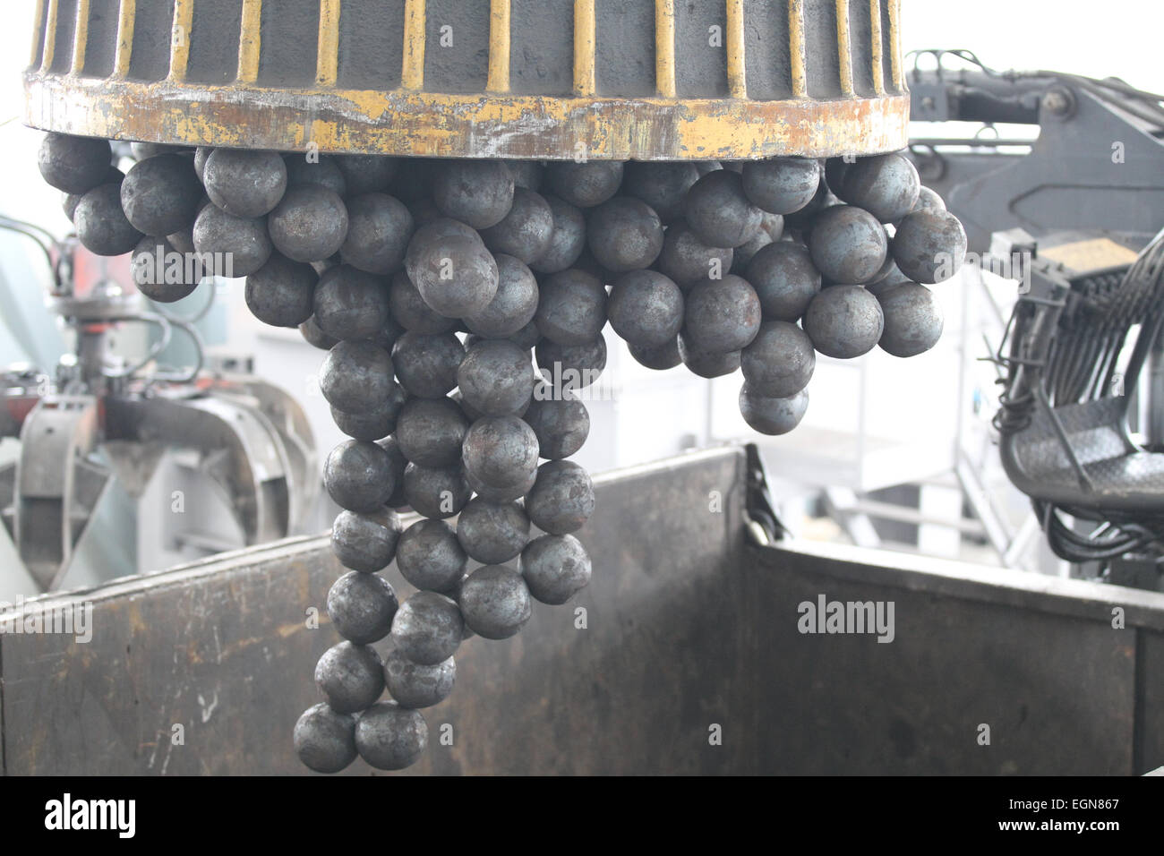 magnet holds grinding balls when loading Stock Photo - Alamy