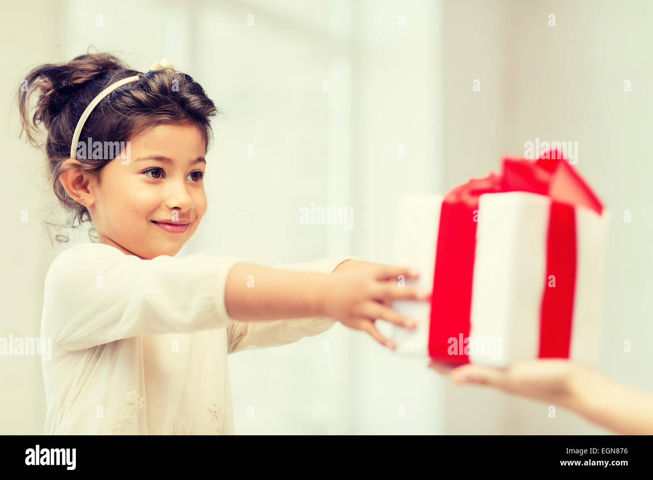 happy child girl with gift box Stock Photo - Alamy