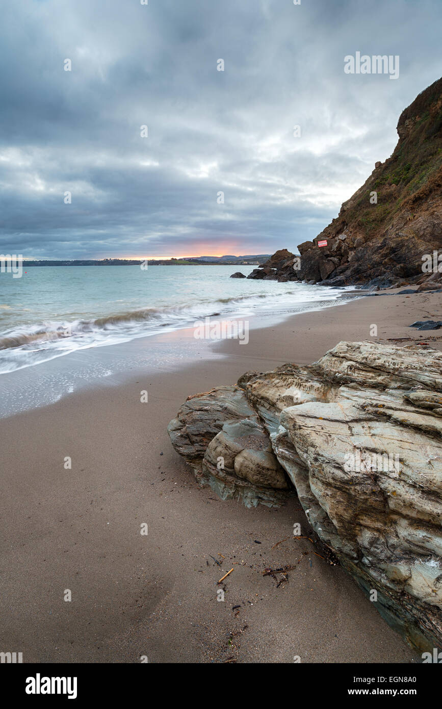 Cloudy sunset at Polkerris Beach on the south coast of Cornwall Stock ...