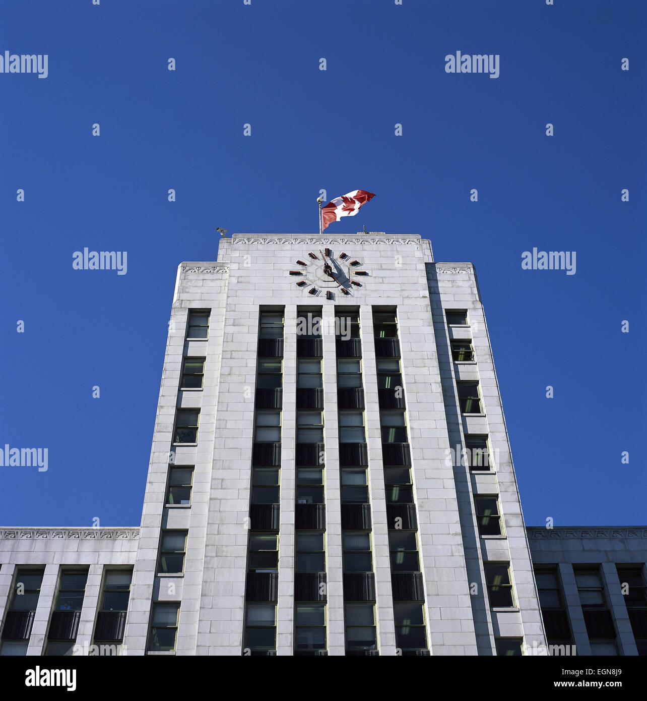 Large city hall building with canadian flag Stock Photo - Alamy
