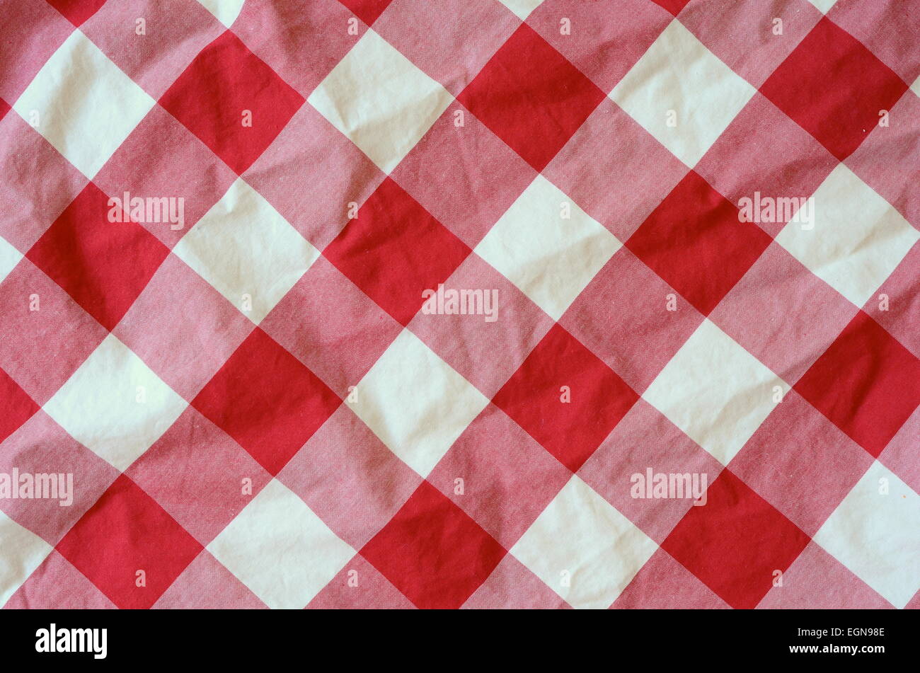 Background Of A Red And White Checked Fabric Stock Photo - Alamy