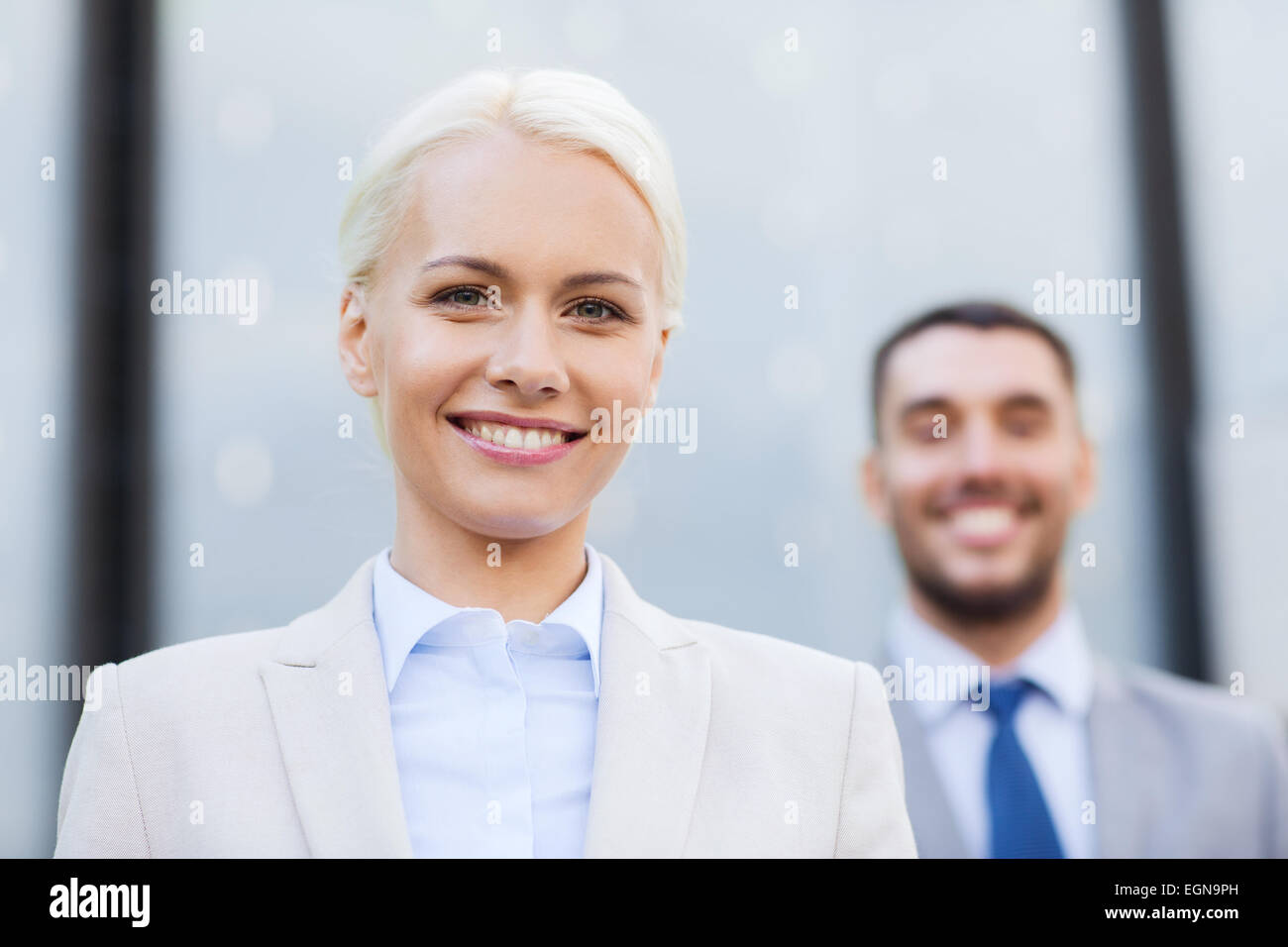 smiling businessmen outdoors Stock Photo - Alamy