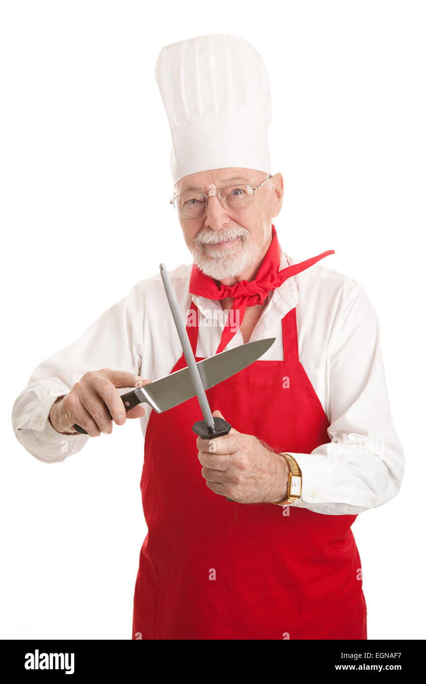 Handsome experienced chef sharpening his knife. Isolated on white Stock ...