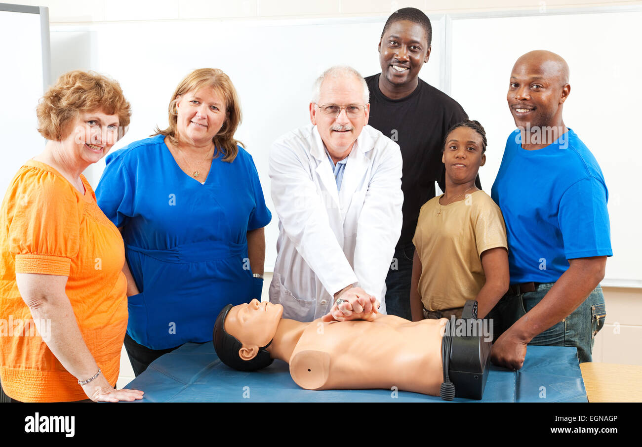 Adult education class learning CPR first aid from a doctor Stock Photo ...
